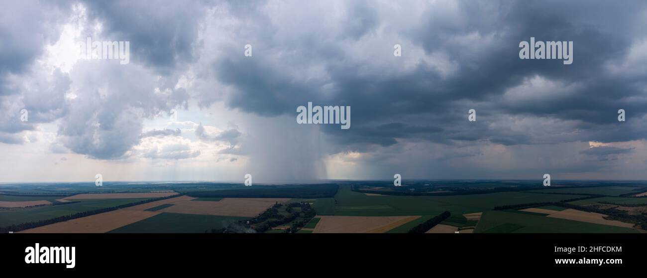 Panorama of cloudy sky with rain Stock Photo - Alamy