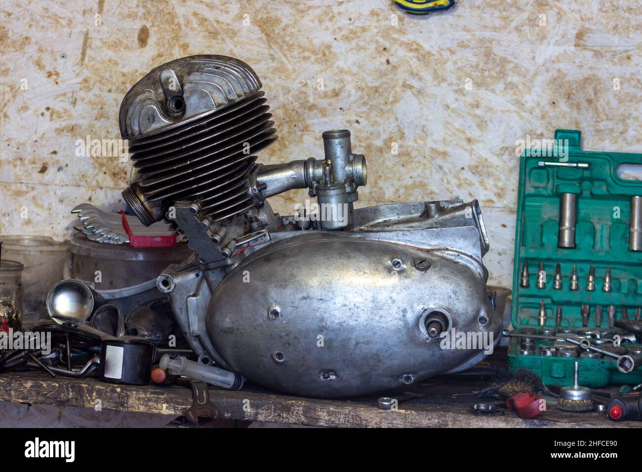 Moto engine on the table with tools Stock Photo - Alamy