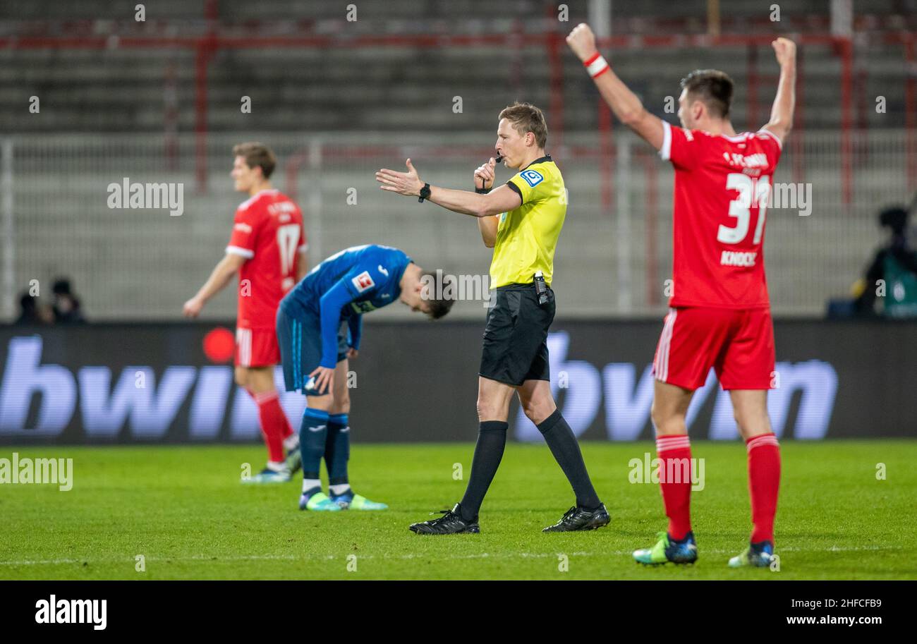 Referee raises arms hi-res stock photography and images - Alamy