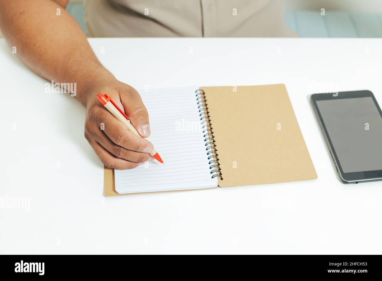 Excited guy writing in hi-res stock photography and images - Alamy
