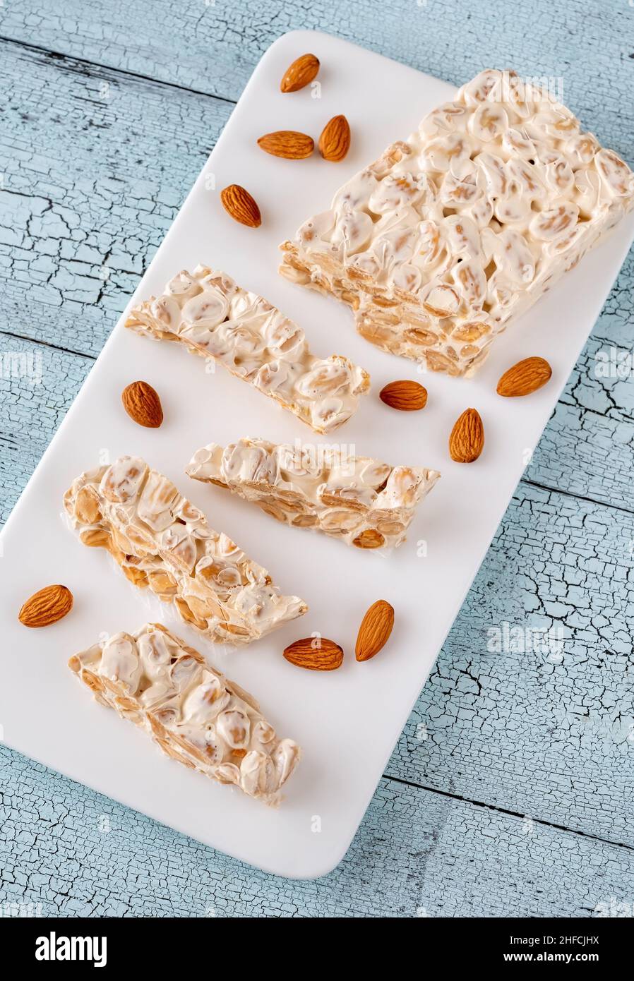 Pieces of turron European nougat confection with almond Stock Photo - Alamy
