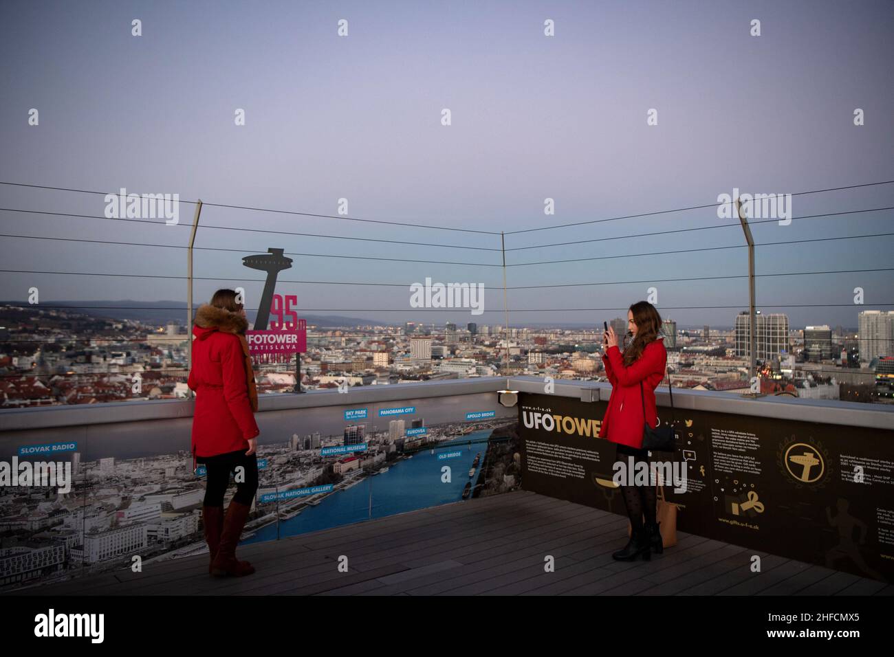 Bratislava, Slovakia. 15th Jan, 2022. A woman takes a photo of another ...