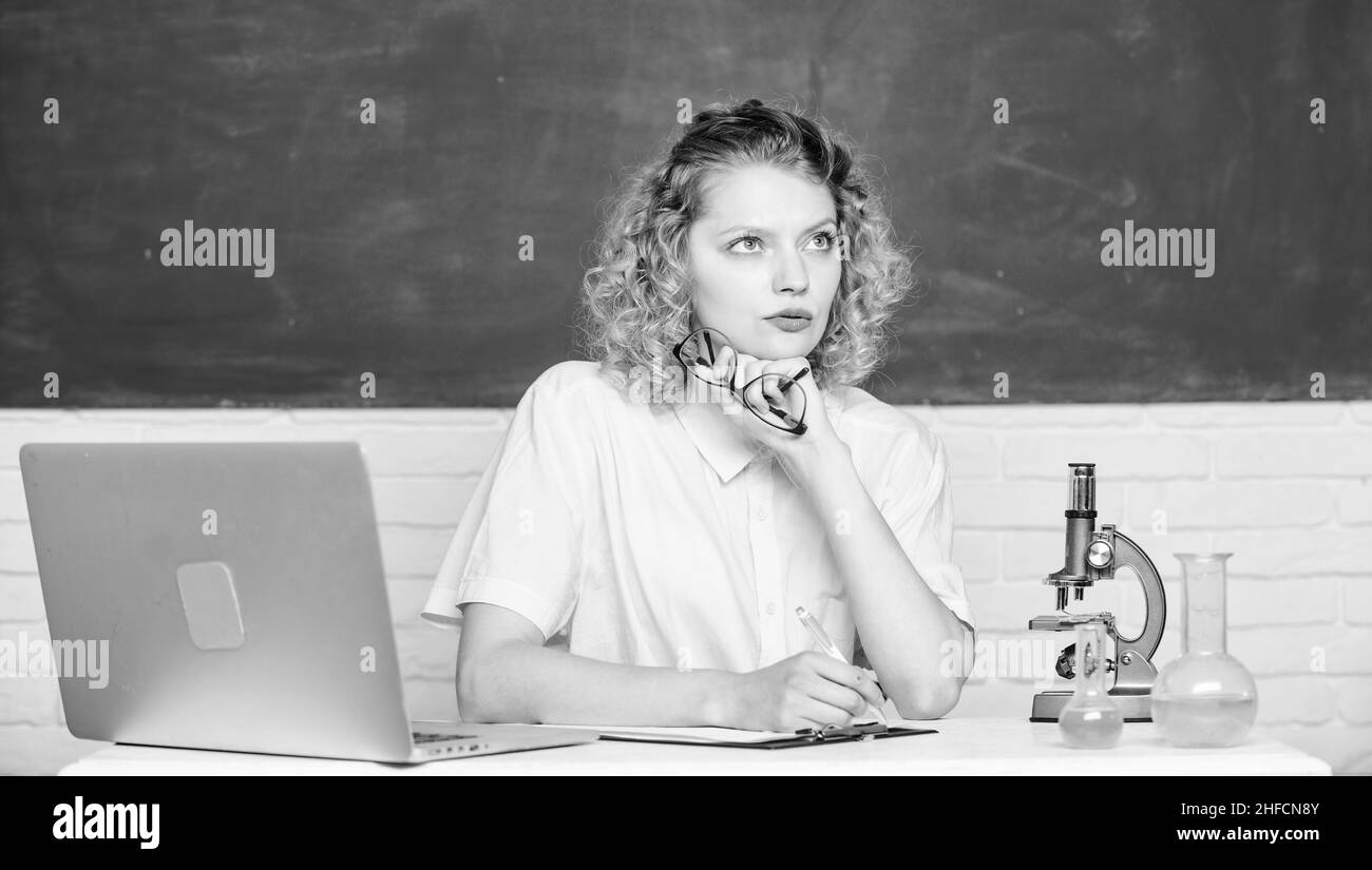 scientist at school lab. biology experiment research. thinking student ...