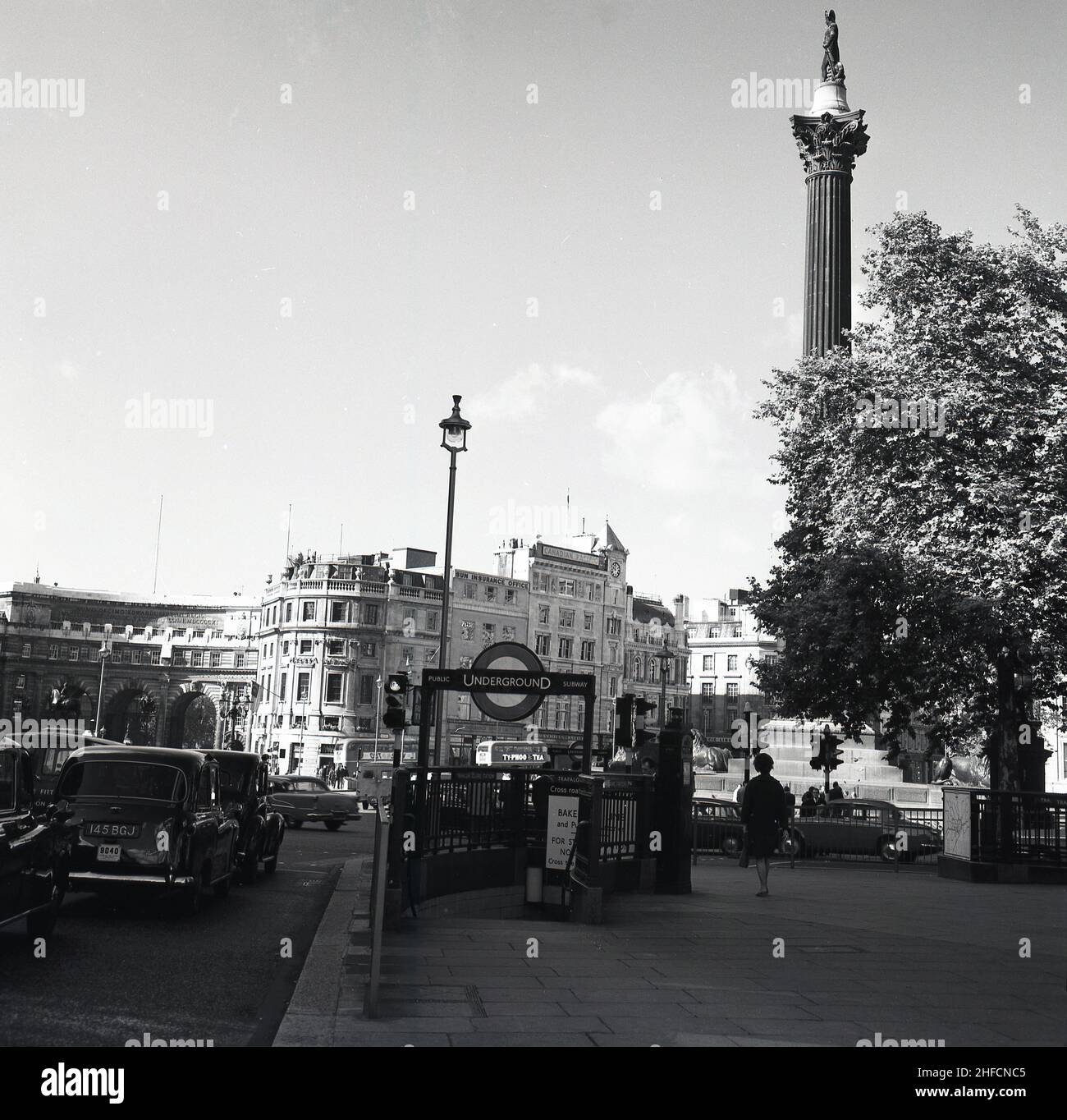 1960s, Beside an entrance to the London Underground, several London ...