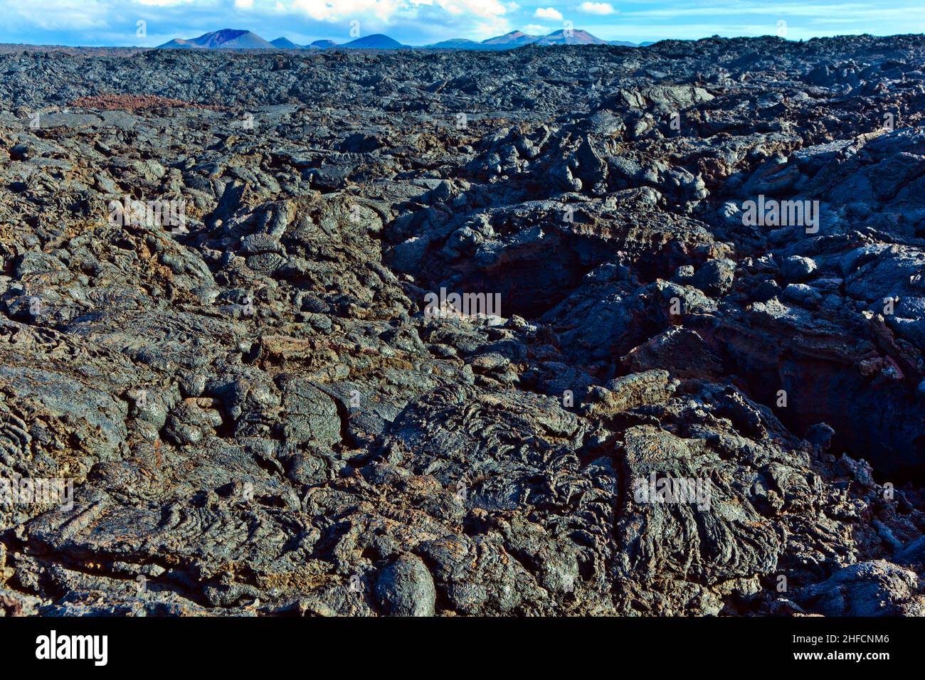 Stones of volcanic flow give a beautiful natural structure Stock Photo ...