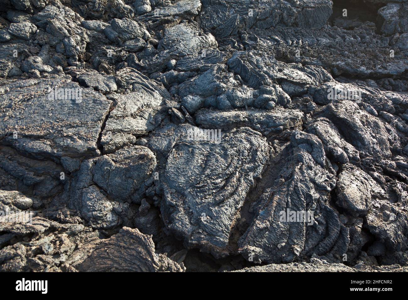 Stones of volcanic flow give a beautiful natural structure Stock Photo ...