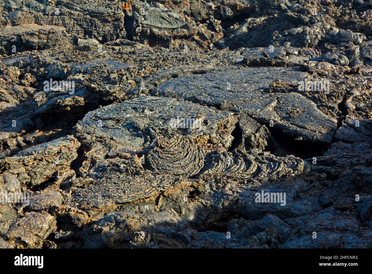 Stones of volcanic flow give a beautiful natural structure Stock Photo ...