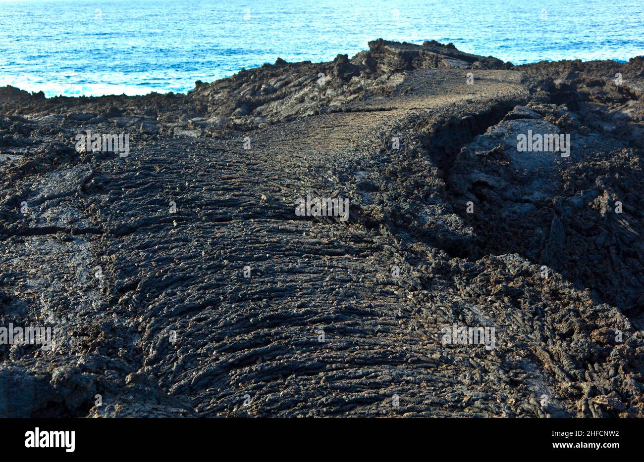Stones of volcanic flow give a beautiful natural structure Stock Photo ...