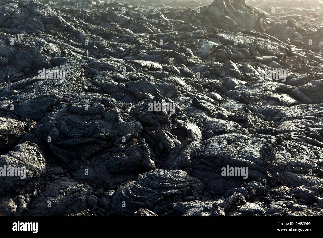 Stones of volcanic flow give a beautiful natural structure Stock Photo ...