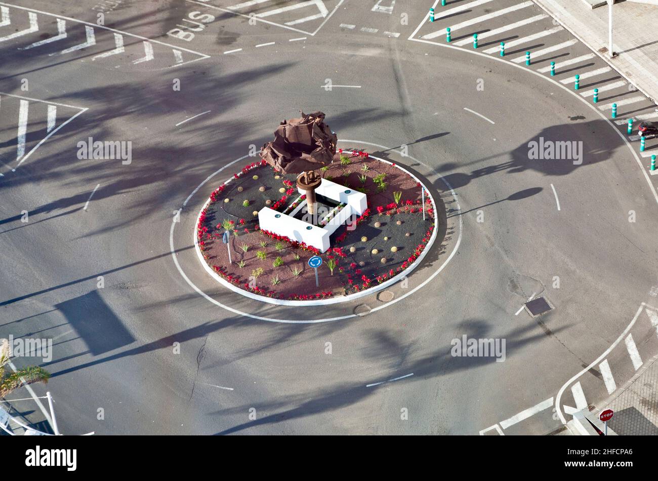 roundabout with sculpture of old cars Stock Photo - Alamy