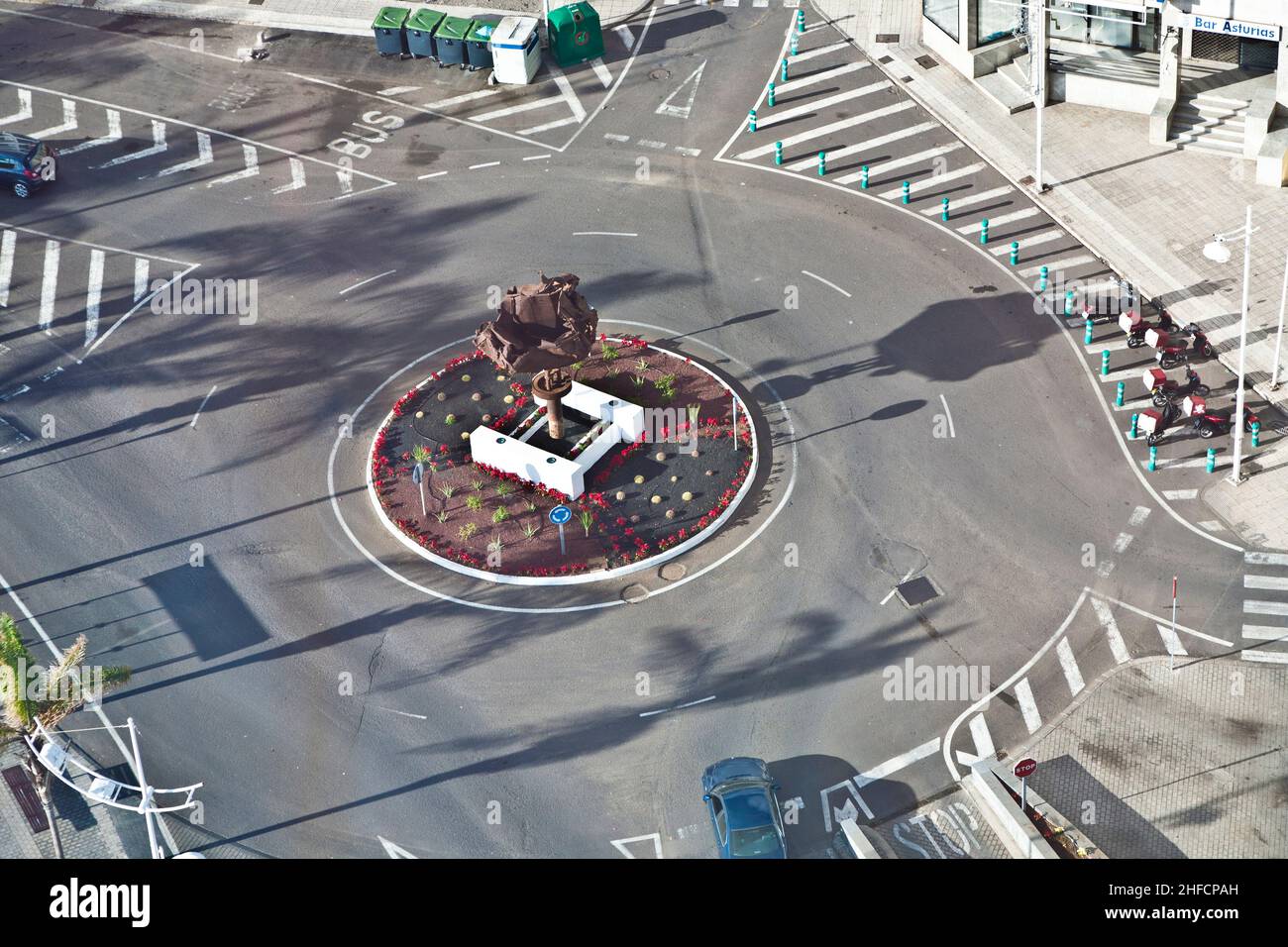 roundabout with sculpture of old cars Stock Photo - Alamy