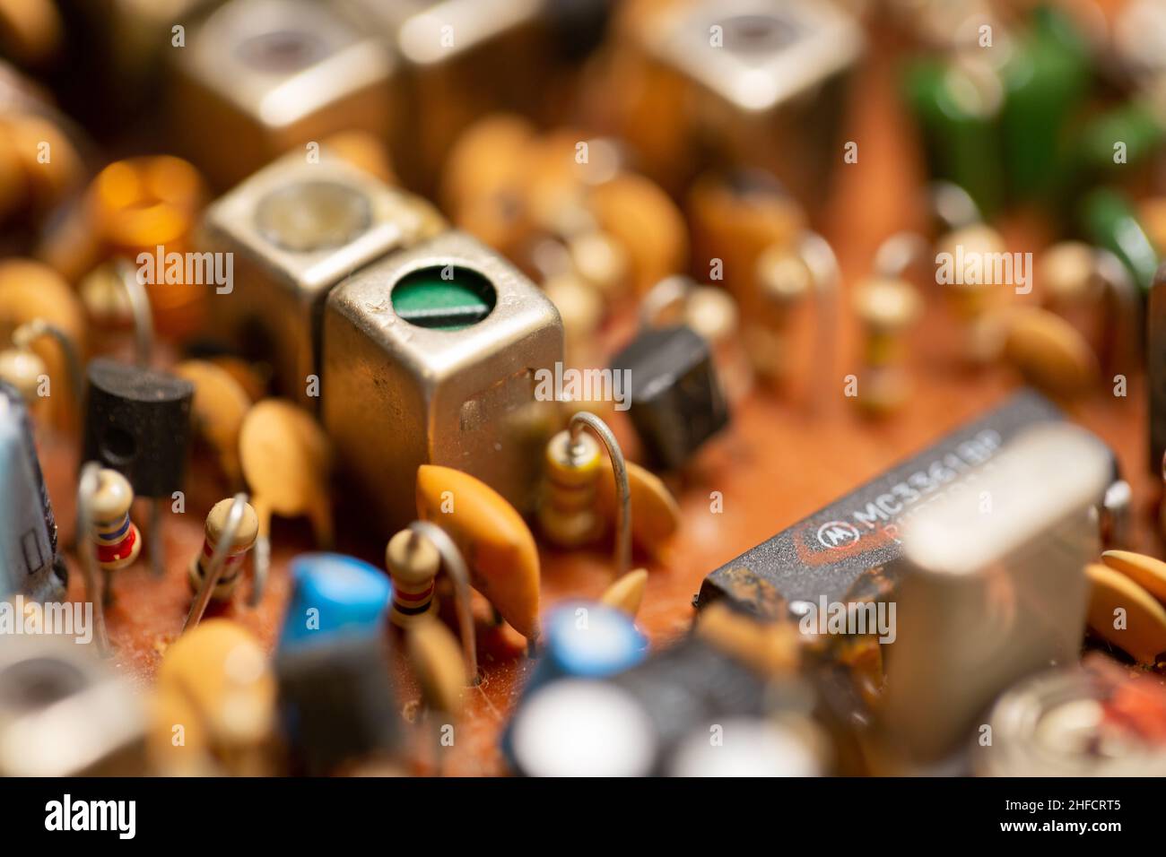Old circuit board with many electronic components Stock Photo - Alamy
