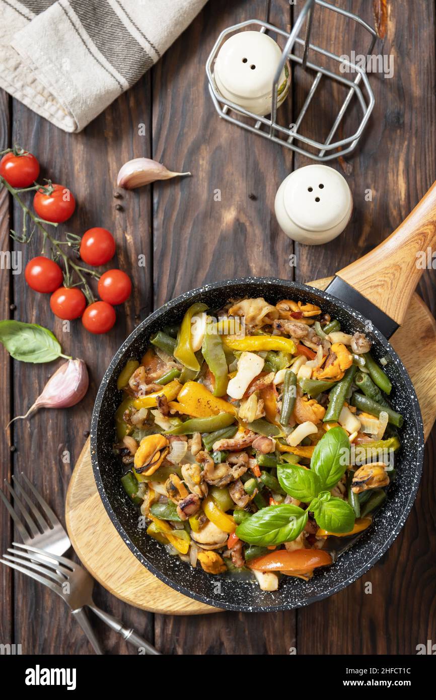 Seafood ragout, healthy mediterranean dinner. Seafood shrimps, calamari ...