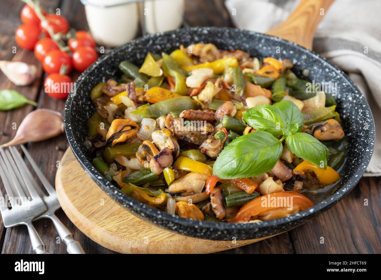 Seafood ragout, healthy mediterranean dinner. Seafood shrimps, calamari ...