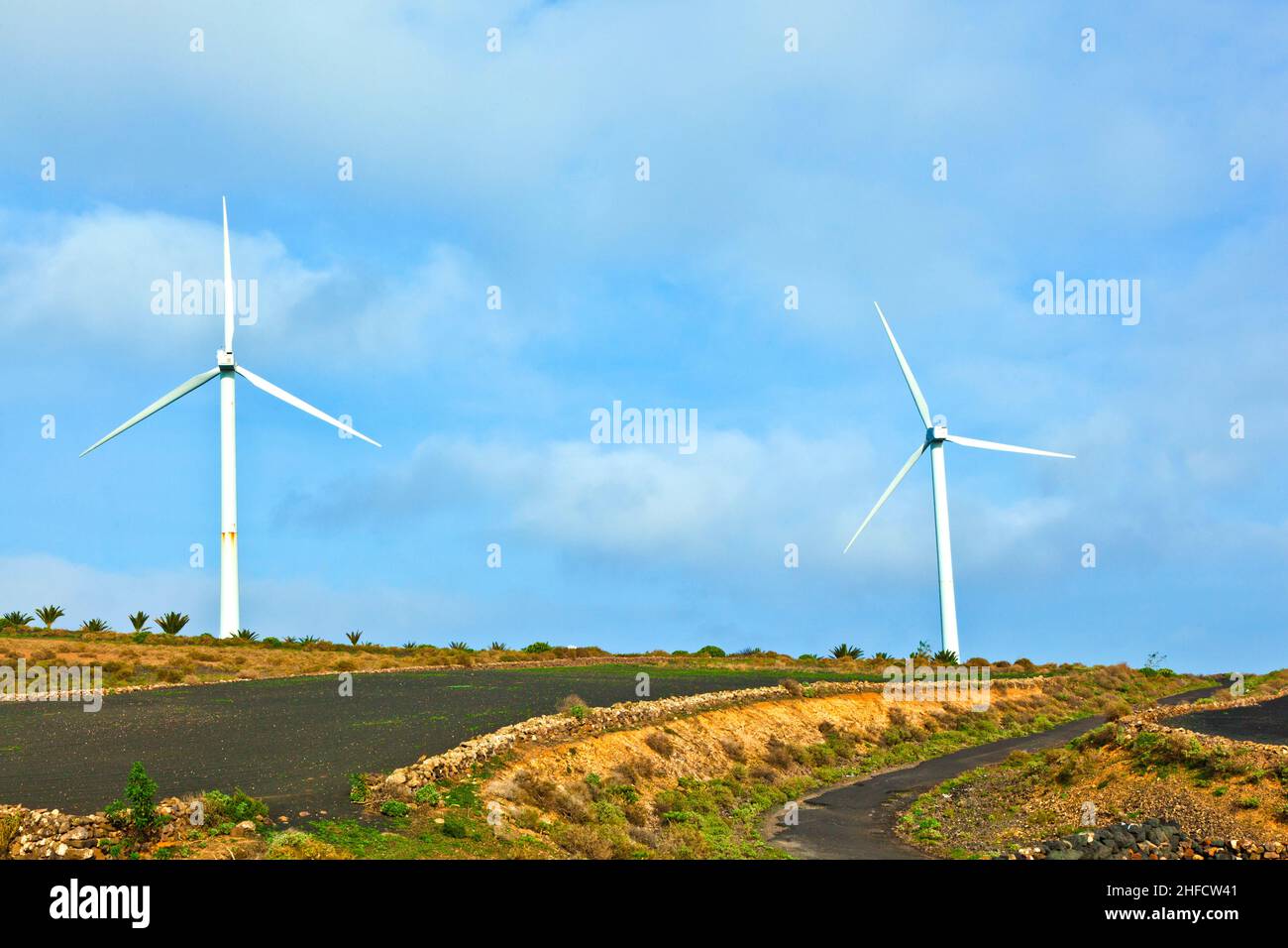 wind engine on top of hill in motion Stock Photo - Alamy