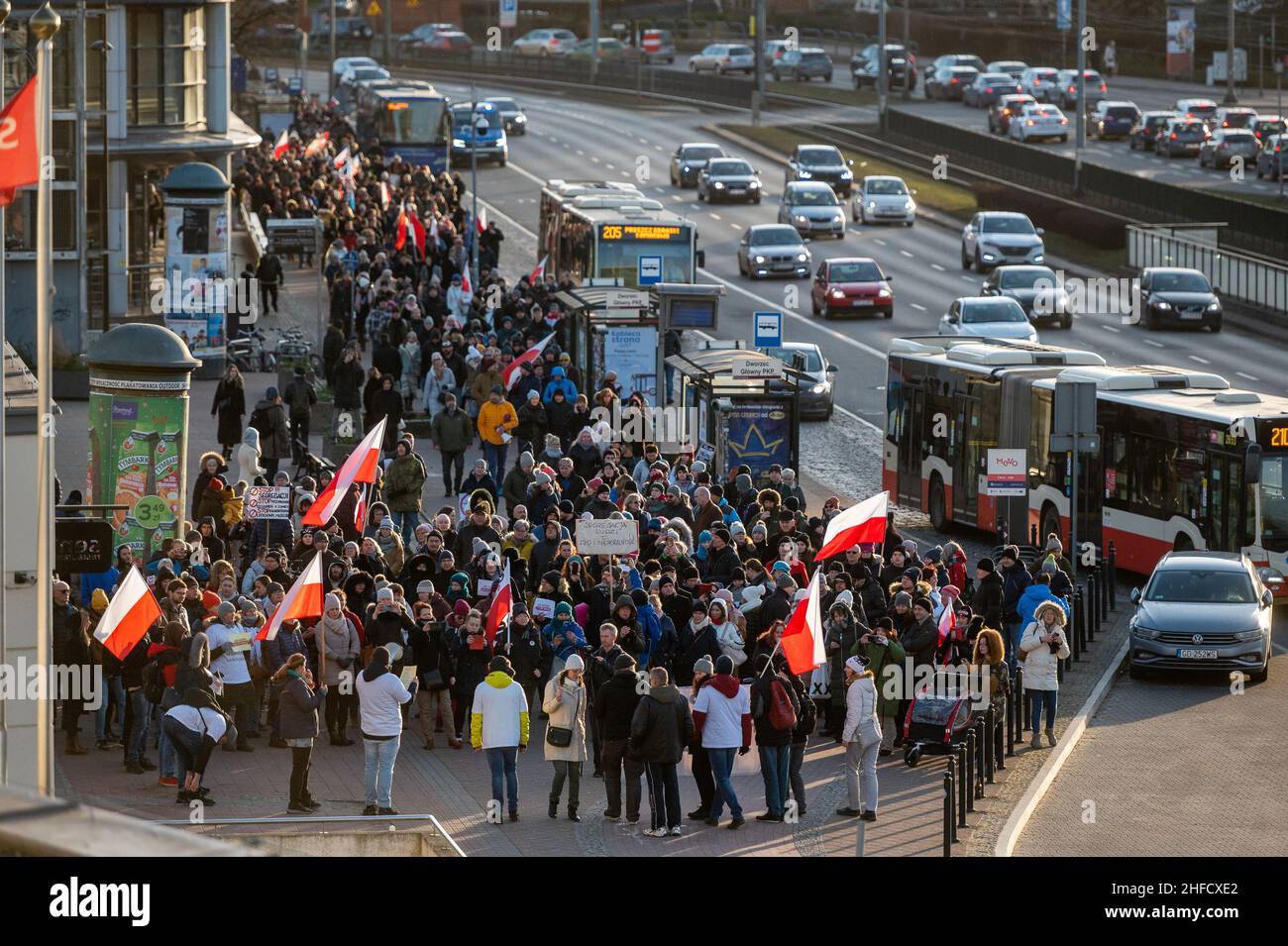 Protesters march on the street during the demonstration."Stop sanitary ...