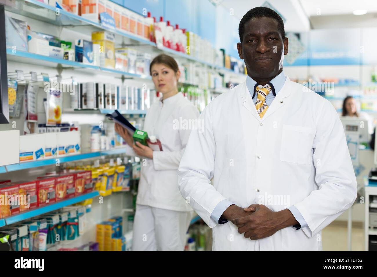 positive man pharmacist of pharmacy Stock Photo - Alamy