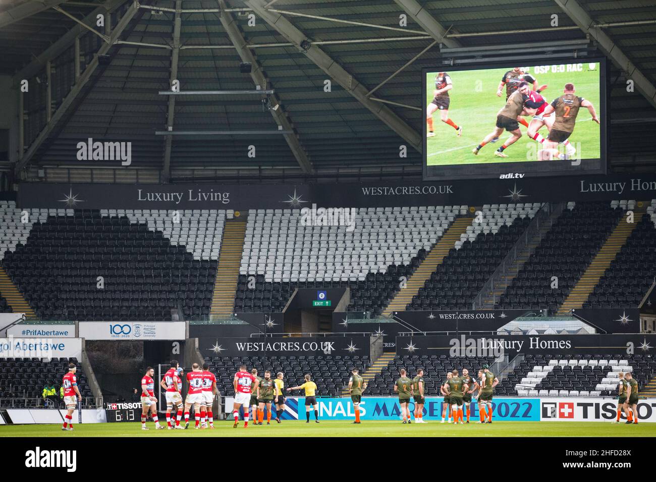 Swansea, UK. 15 January, 2022. Referee Christophe Ridley reviews on the ...