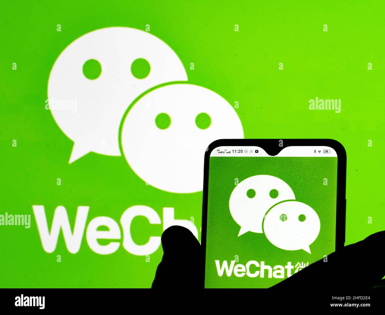 In this photo illustration, the WeChat logo seen displayed on a ...