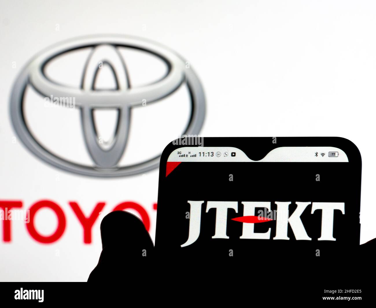 In this photo illustration, the JTEKT Corporation part by Toyota Group logo is seen displayed on ...