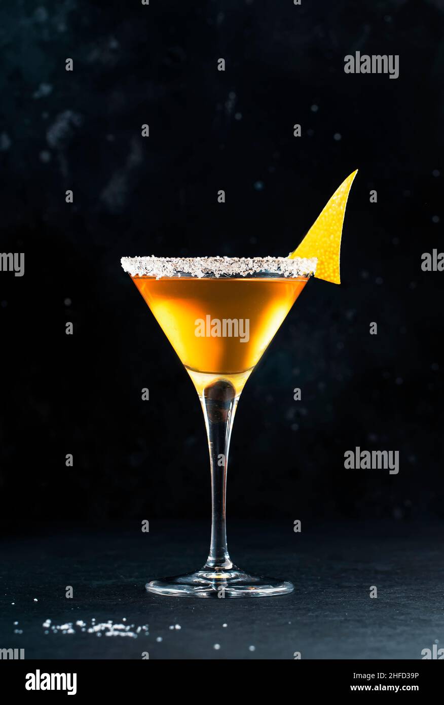 Sidecar cocktail with cognac, liqueur, lemon juice and ice. Black ...