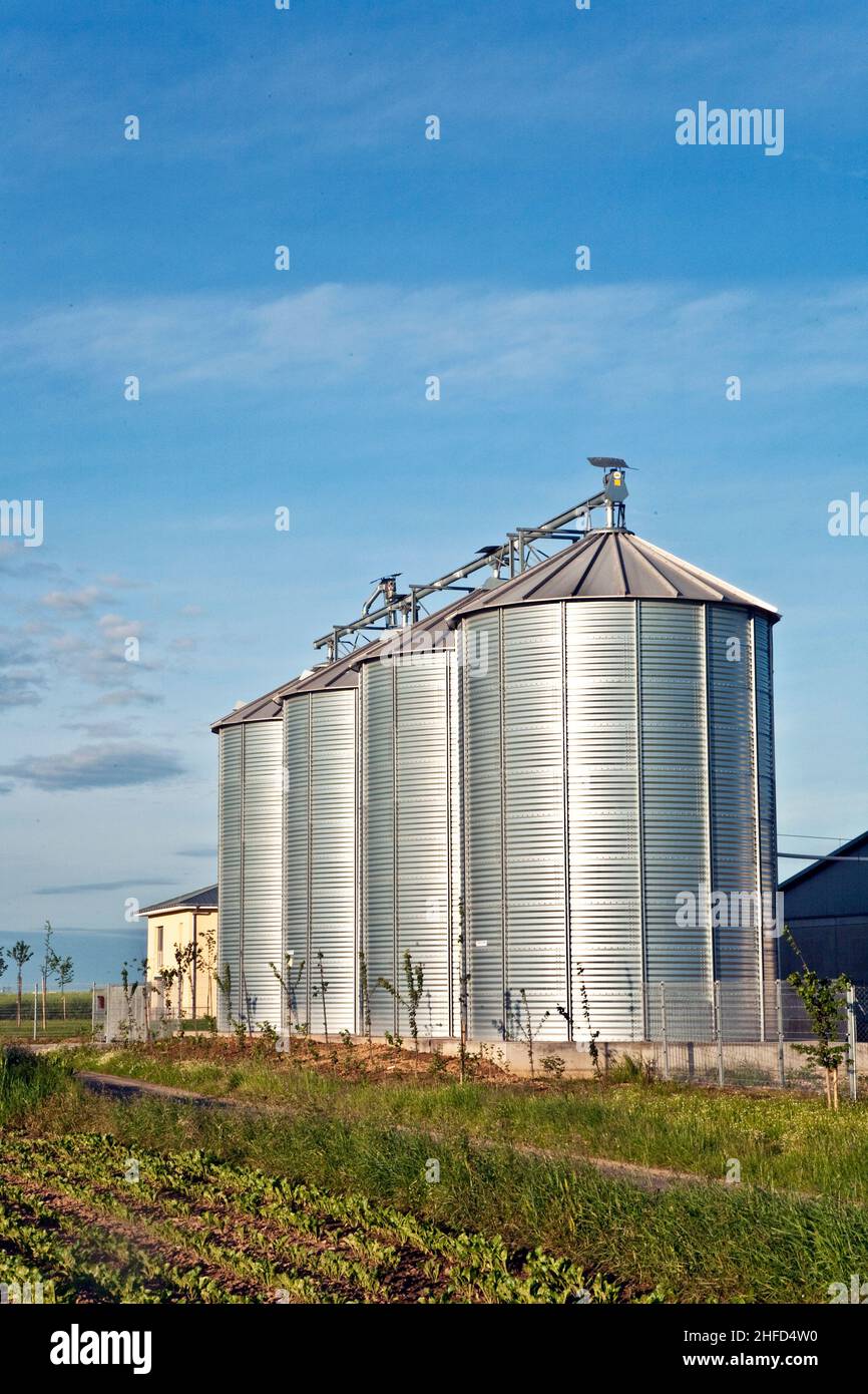 silos in beautiful landscape and acres Stock Photo - Alamy