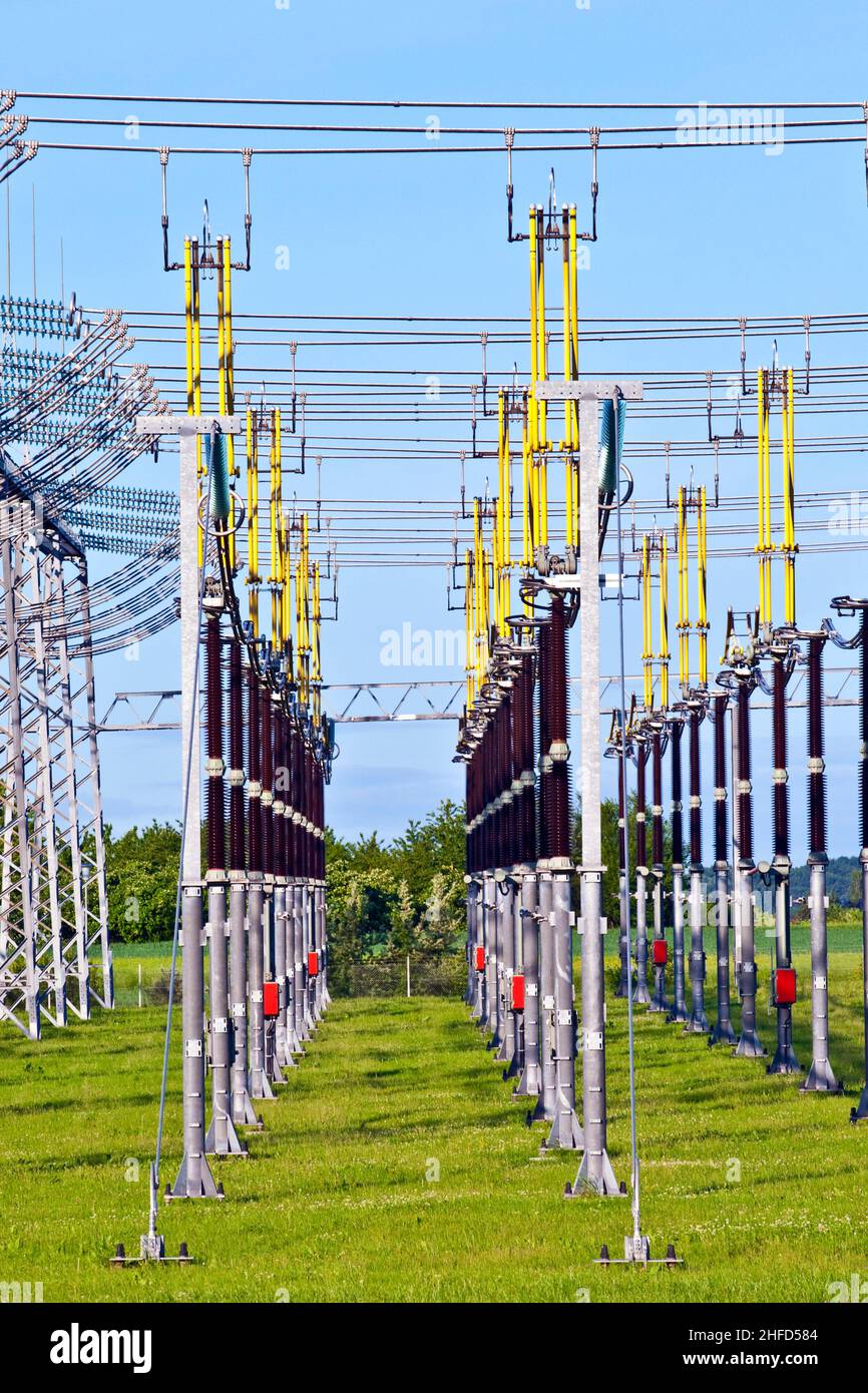 electrical power plant in beautiful colorful meadow Stock Photo - Alamy