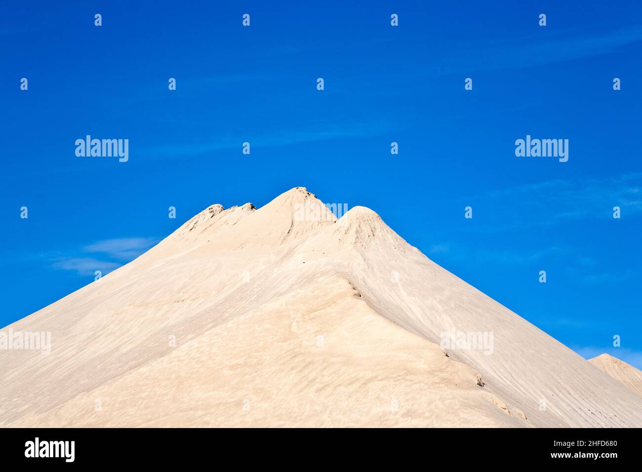 dunes of fine sand build by digging Stock Photo - Alamy
