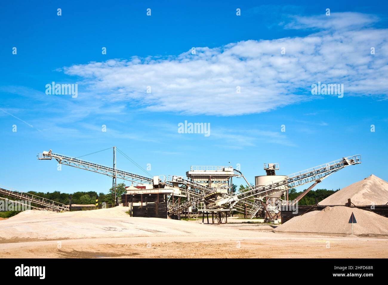 Conveyor on site at gravel pit hill Stock Photo - Alamy
