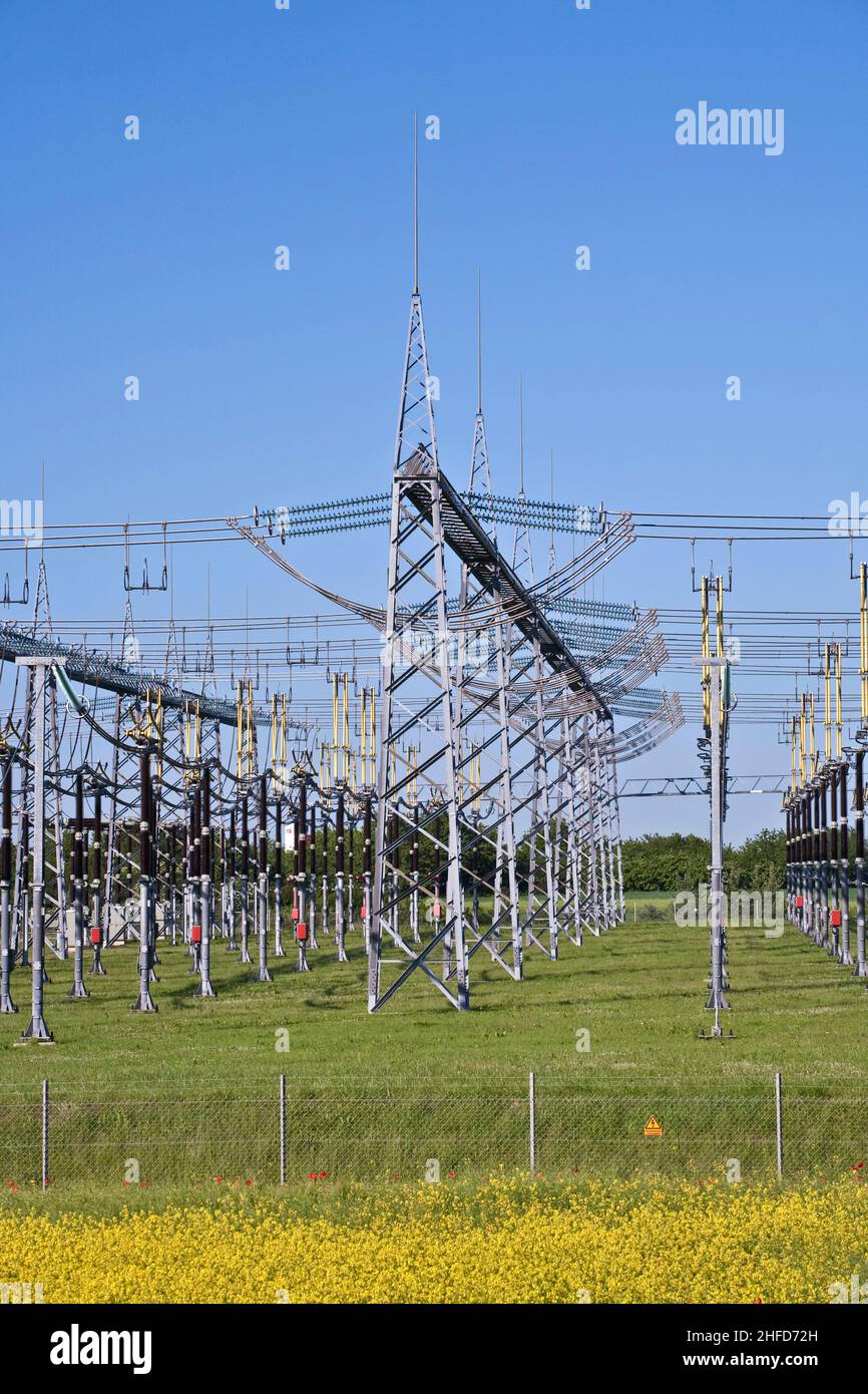 electrical power plant in beautiful colorful meadow Stock Photo - Alamy