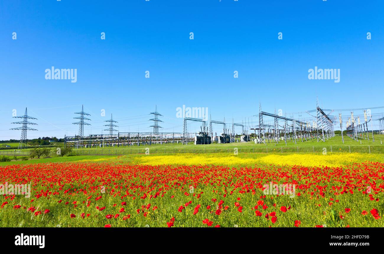 electrical power plant in beautiful colorful meadow Stock Photo - Alamy