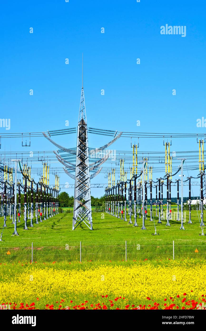 electrical power plant in beautiful colorful meadow Stock Photo - Alamy