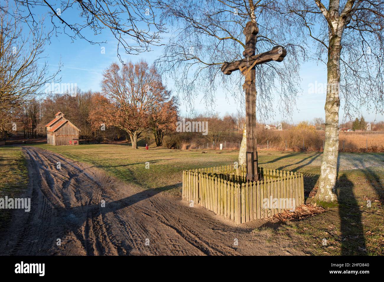 Roadside wooden cross in Polish countryside, winter landscape Stock ...