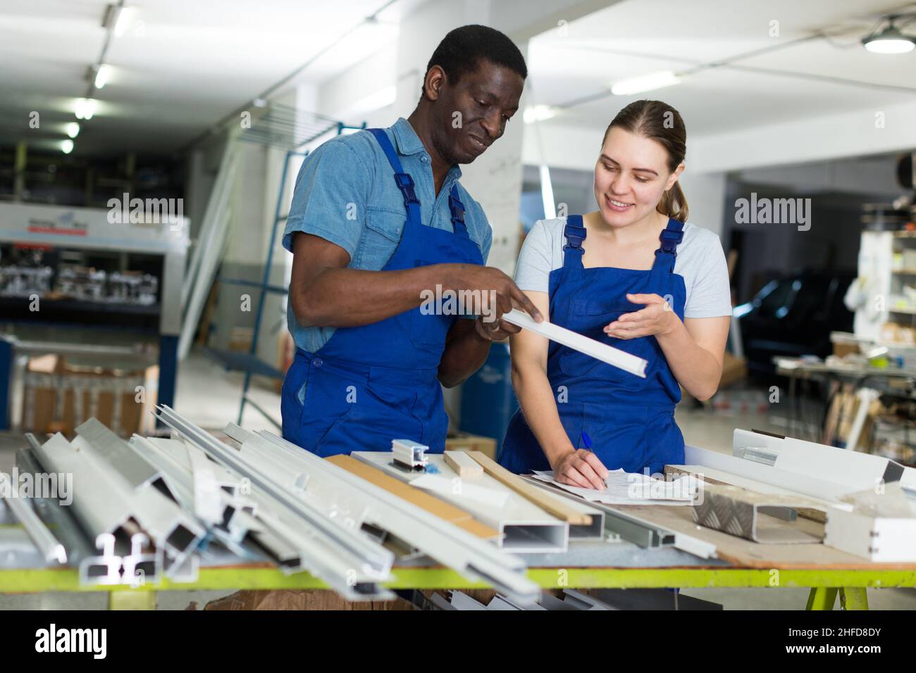 Two masters are working on their workplace Stock Photo - Alamy