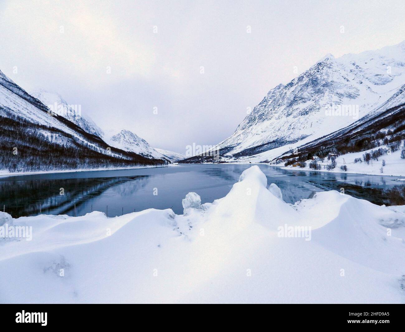Winter in Kjosen on the island Kvaloya at the Kaldfjord, Norway Stock ...