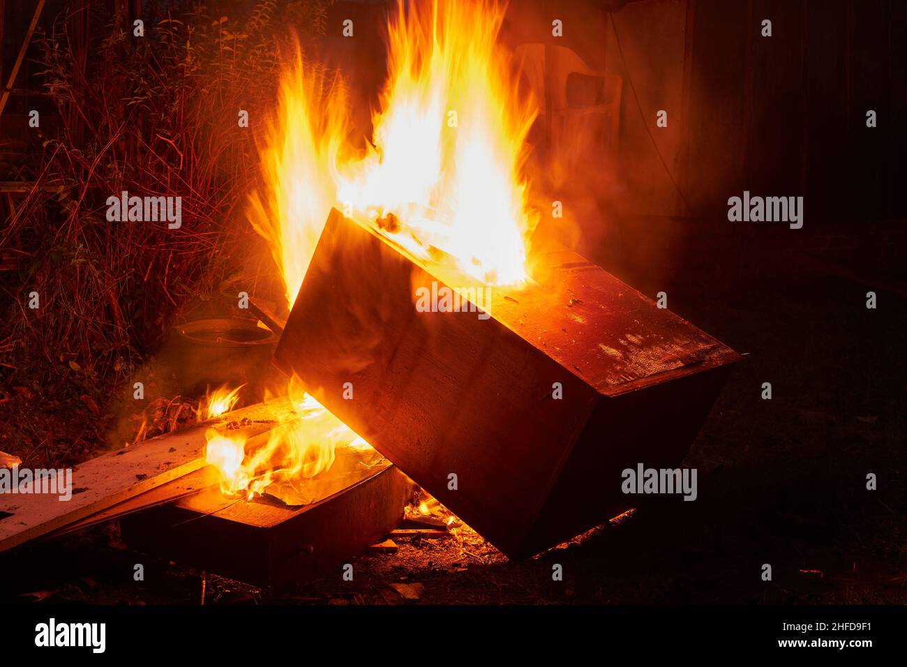 Old furniture on a bonfire Stock Photo - Alamy