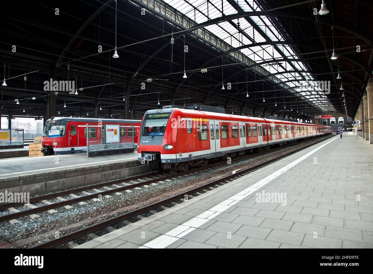 classicistic iron train station from inside with train Stock Photo - Alamy