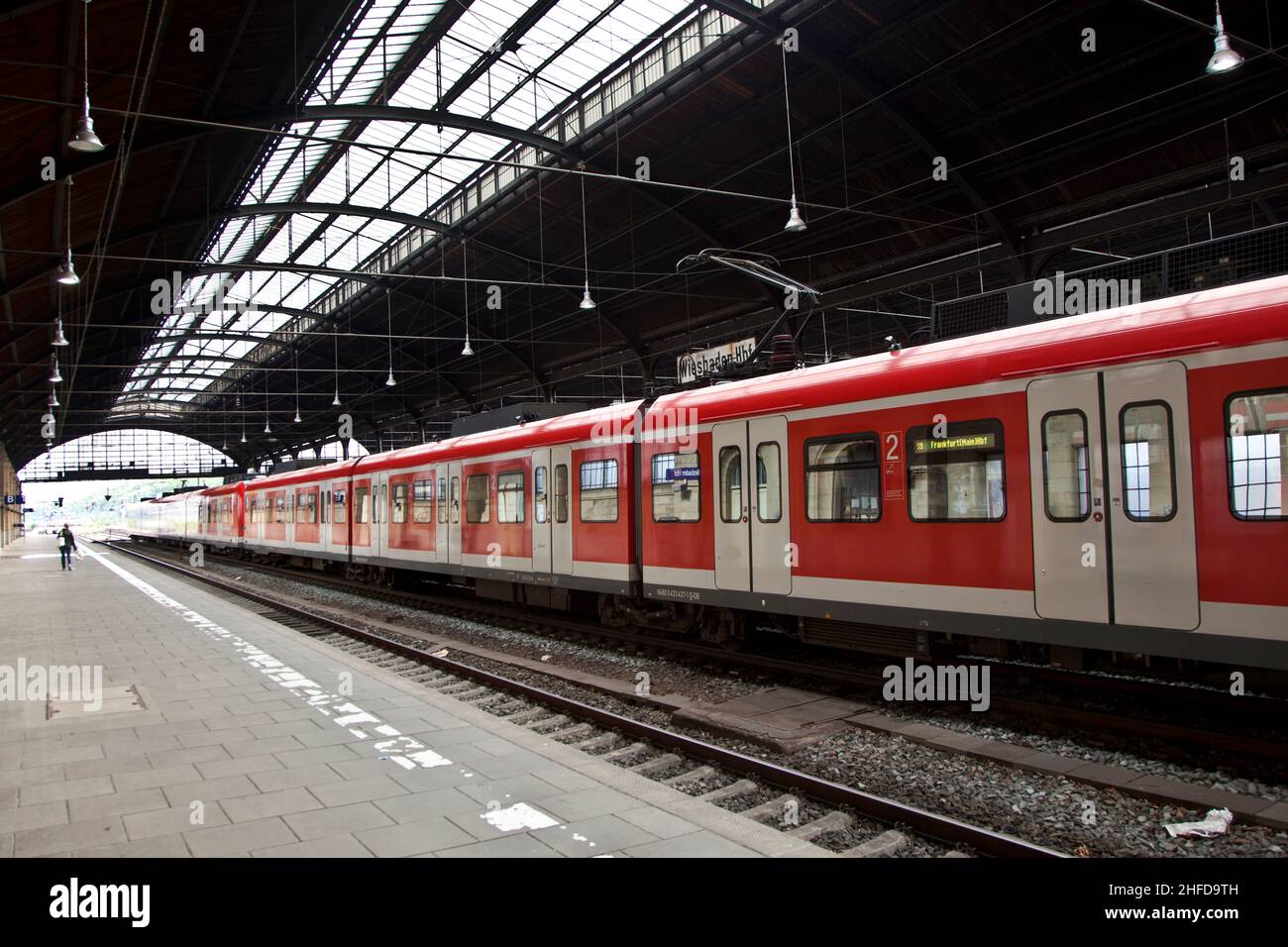 classicistic iron train station from inside with train Stock Photo - Alamy