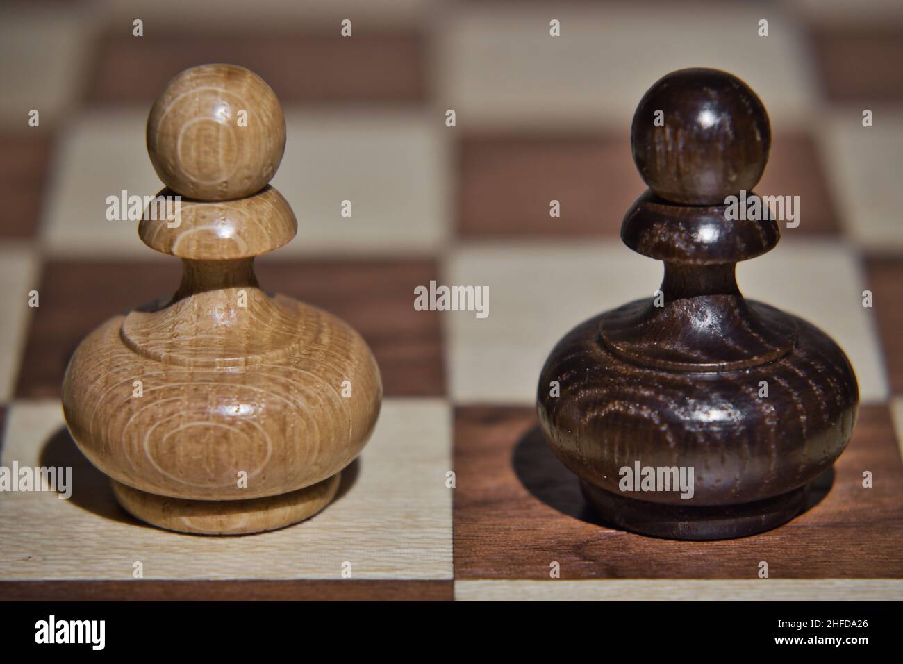 Chess game with wooden chess pieces. The debut of chess game. White and ...