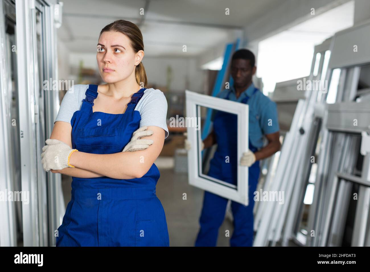 Portrait of sad woman worker who is standing Stock Photo - Alamy