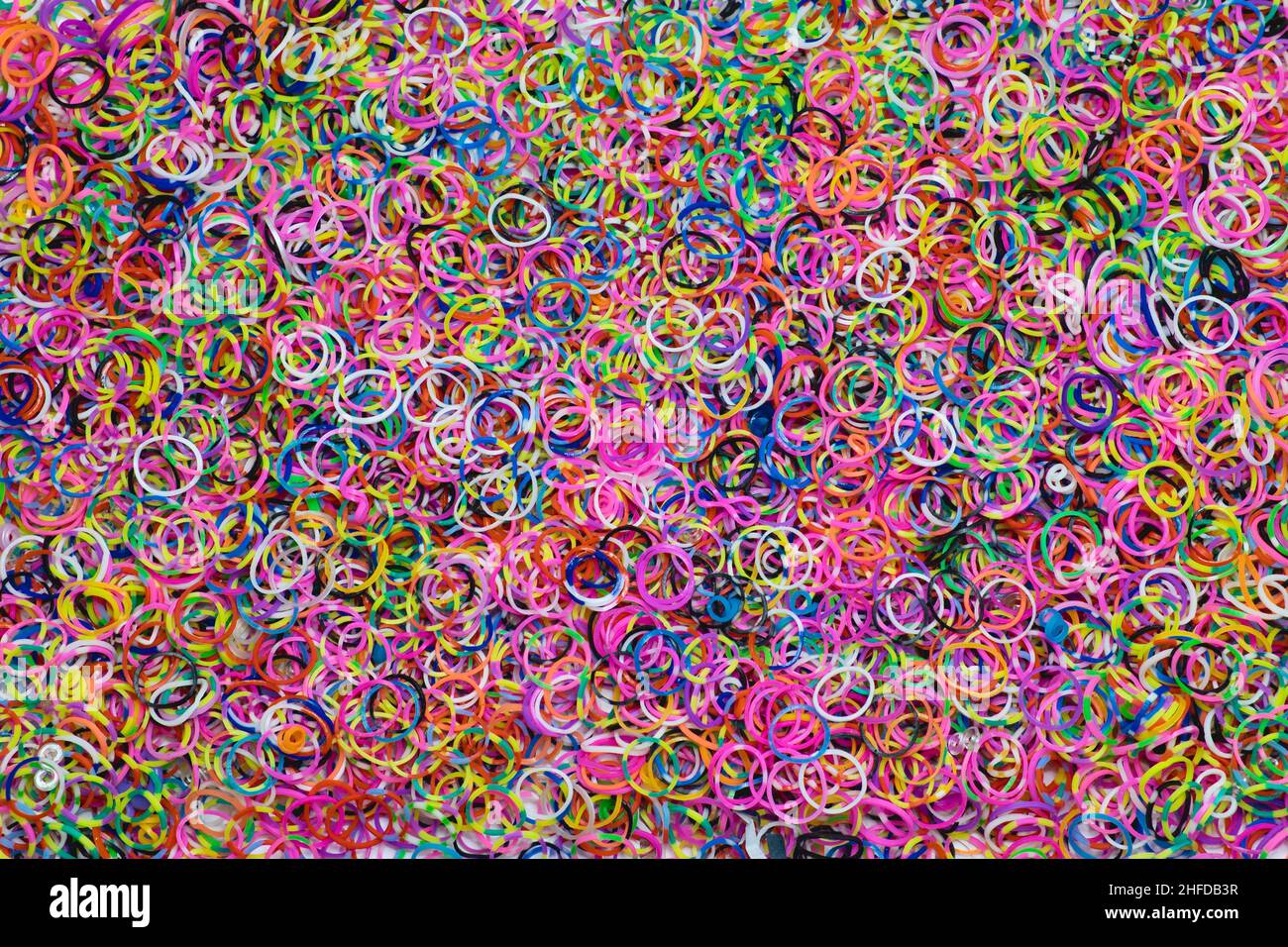 Colorful elastic rubber hair bands. Colorful background Stock Photo - Alamy