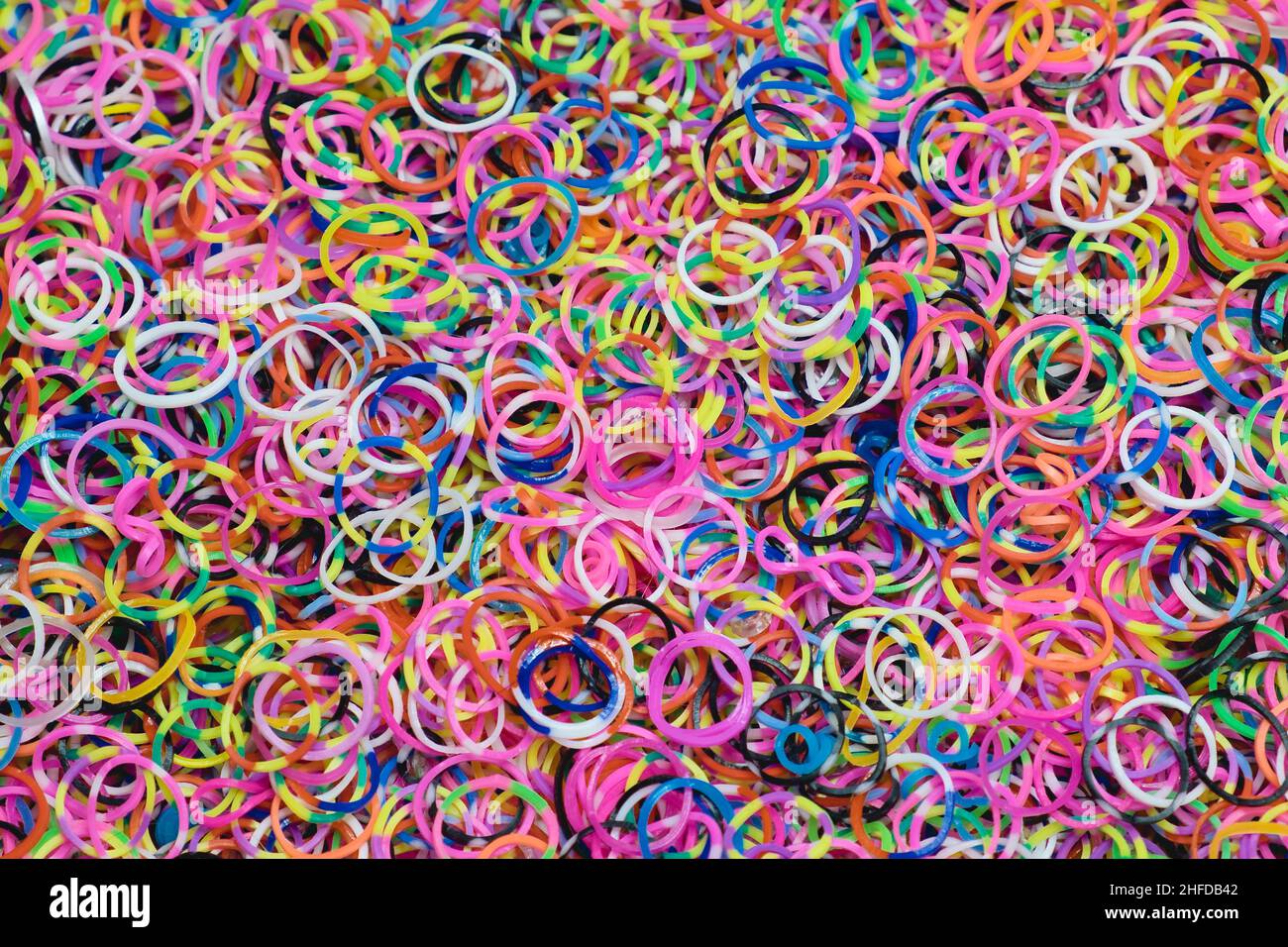 Colorful elastic rubber hair bands. Colorful background Stock Photo - Alamy