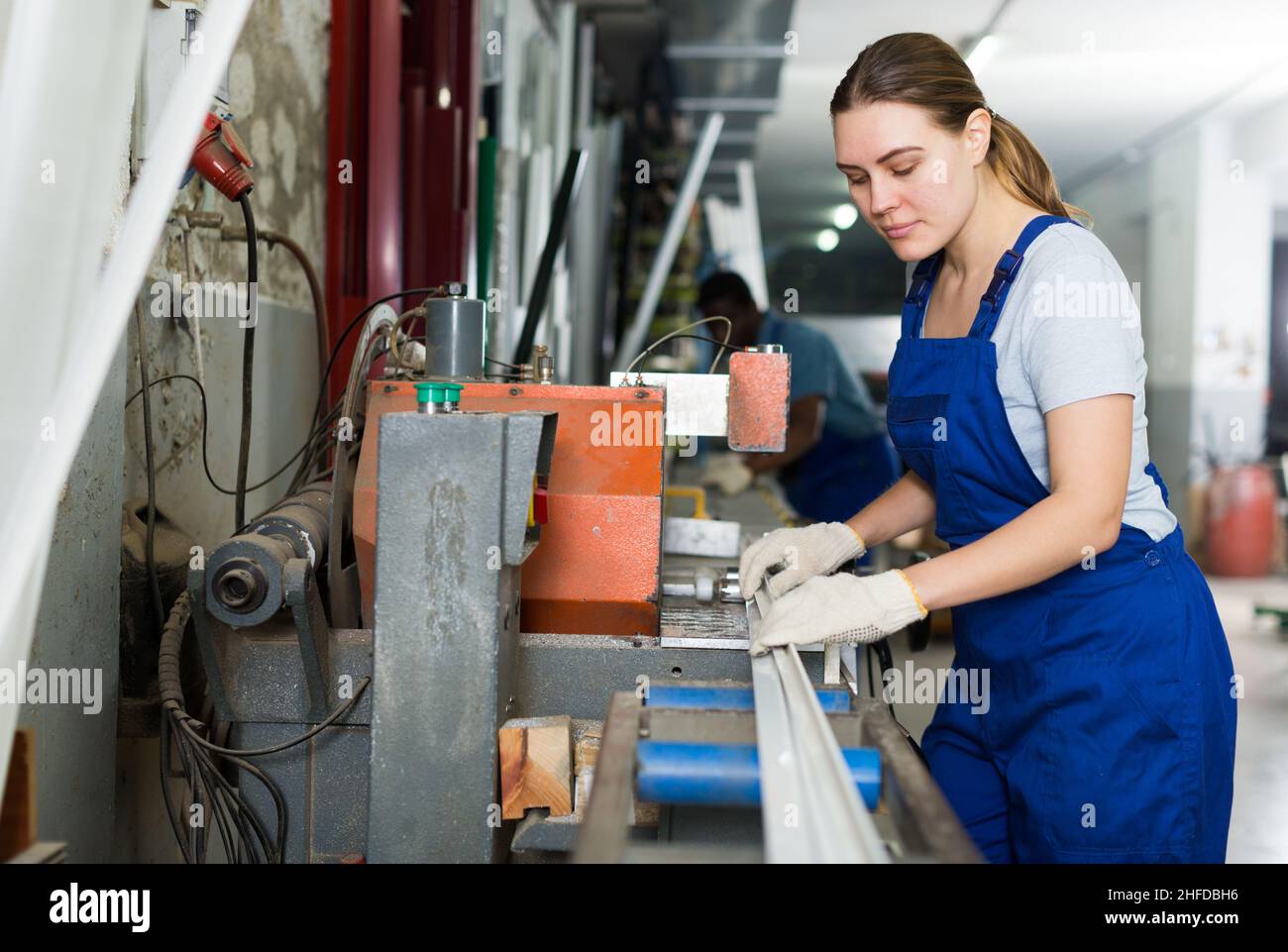 Female master working machine hi-res stock photography and images - Alamy