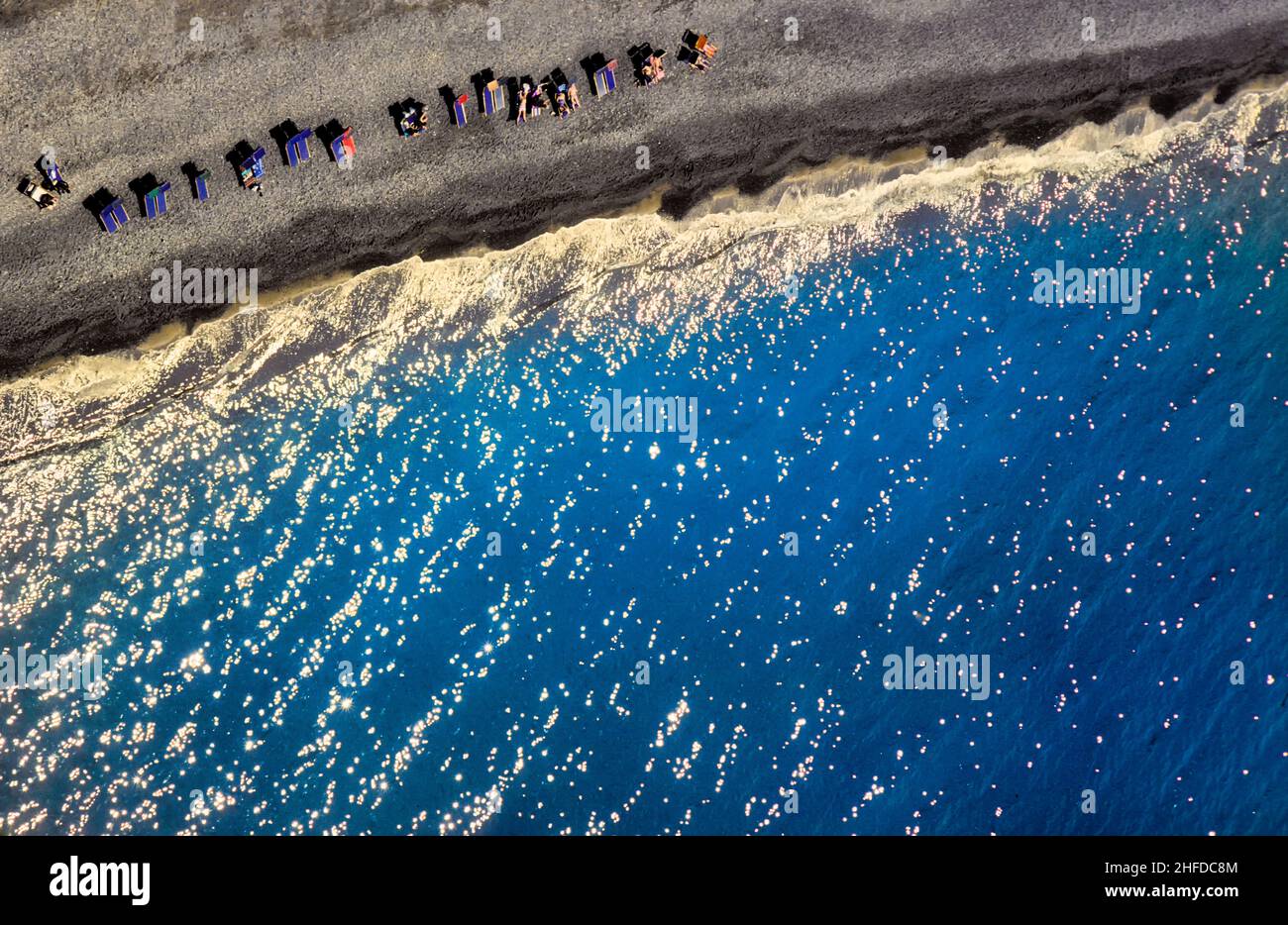 people relax at the beautiful beach in apulia Stock Photo - Alamy