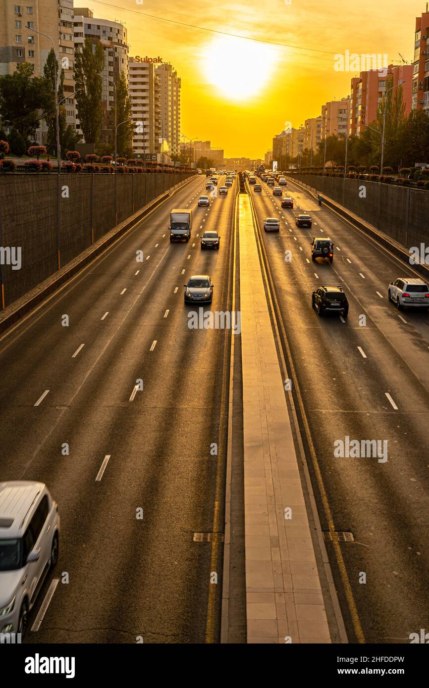 Sunset top view of Almaty avenue with easy traffic, Kazakhstan, Central ...