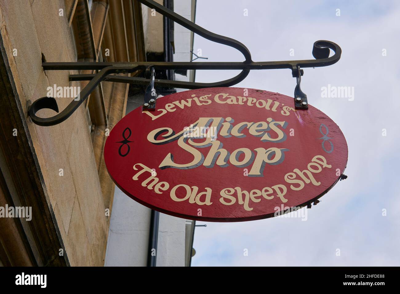 OXFORD, UK - April 13, 2021. Alice's shop signs in front of the first ...