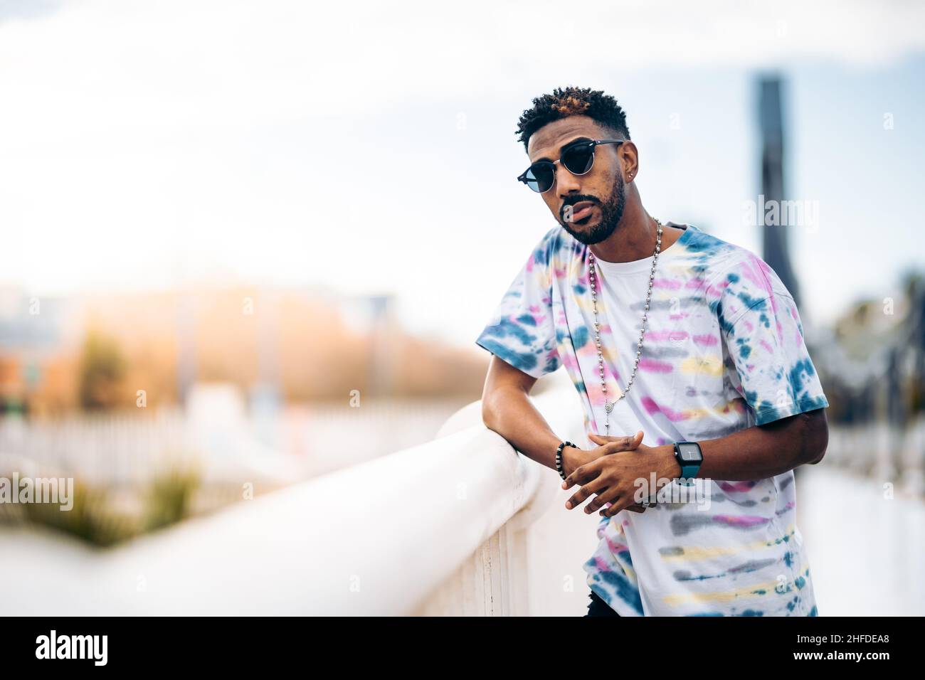 Stylish young man leaning hi-res stock photography and images - Alamy