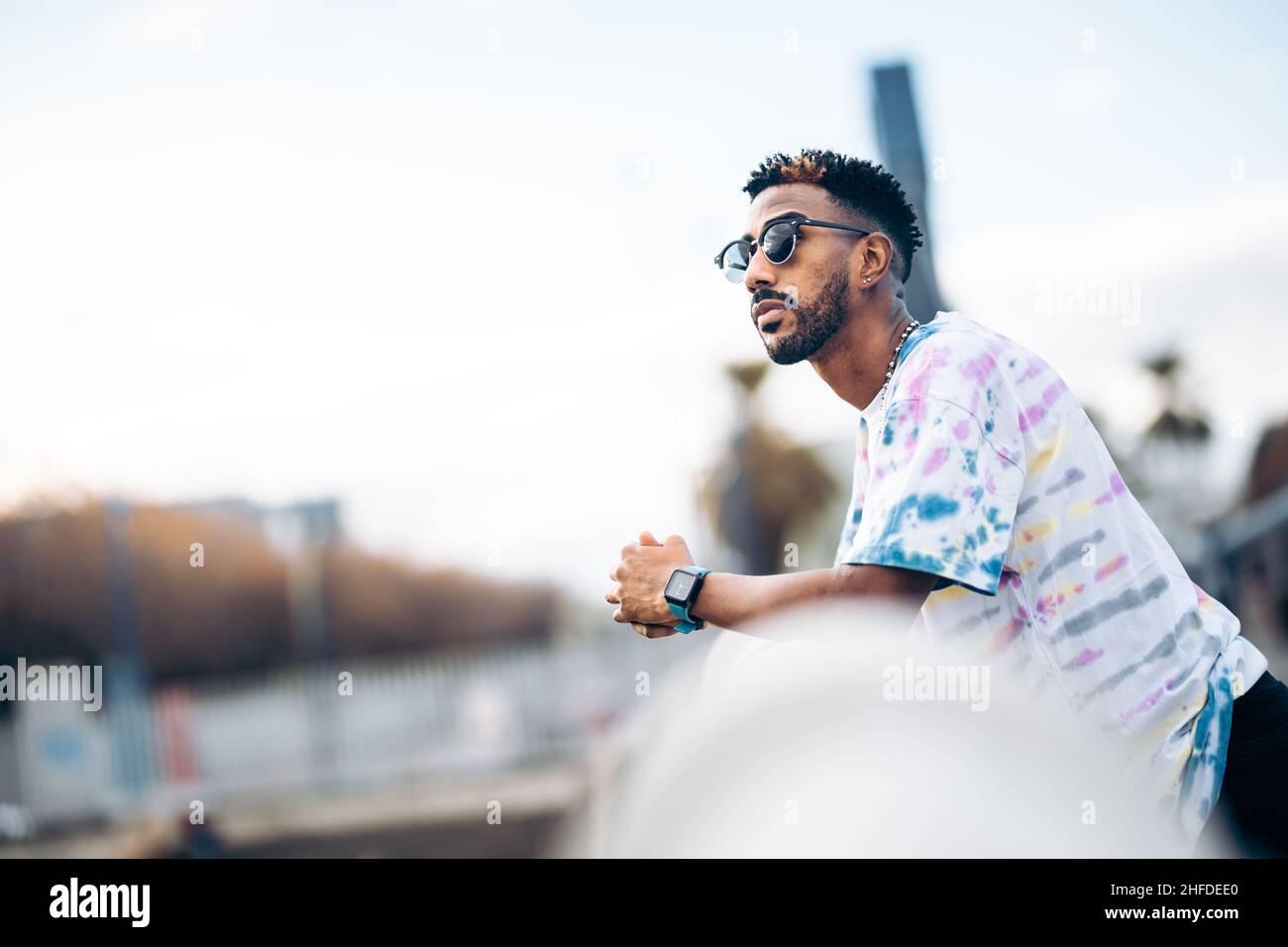 Man leaning on bridge railing hi-res stock photography and images - Alamy