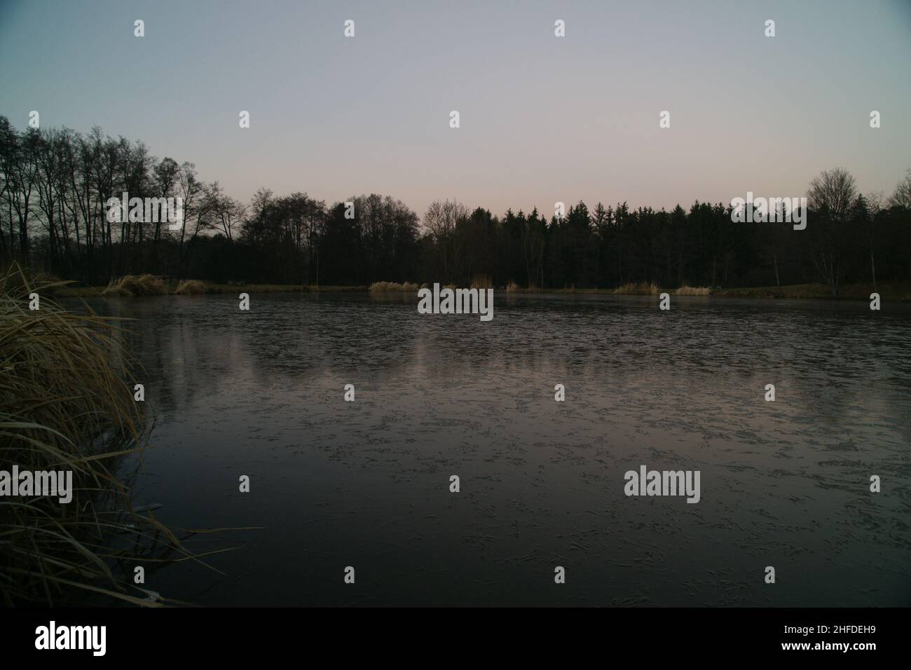 Dark frozen lake hi-res stock photography and images - Alamy