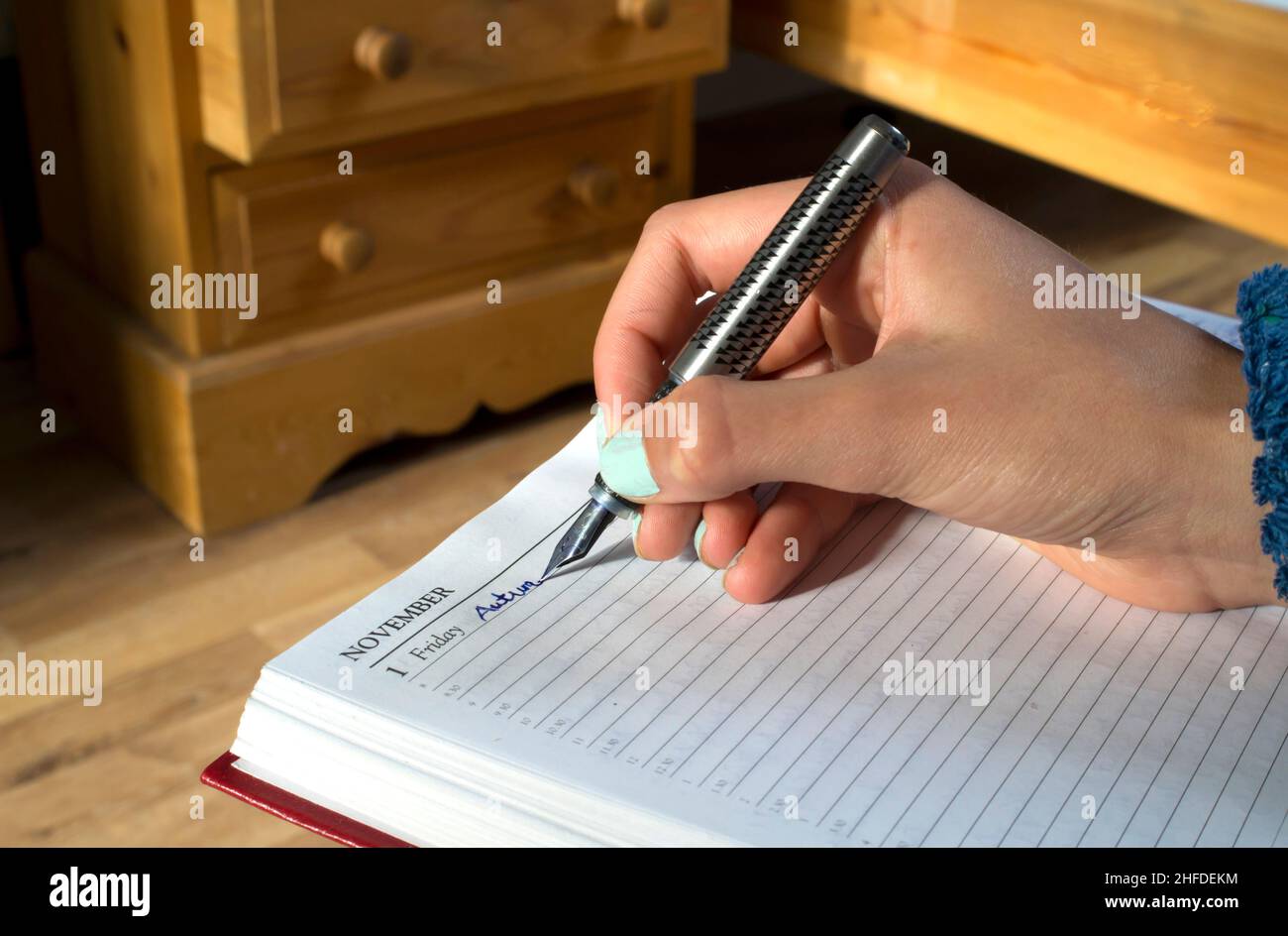 Writing with ink pen Stock Photo - Alamy